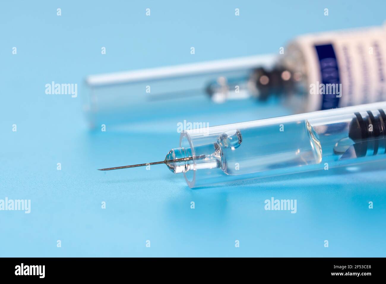 Macro photography of an pre-filled syringe with an automatic safety ...