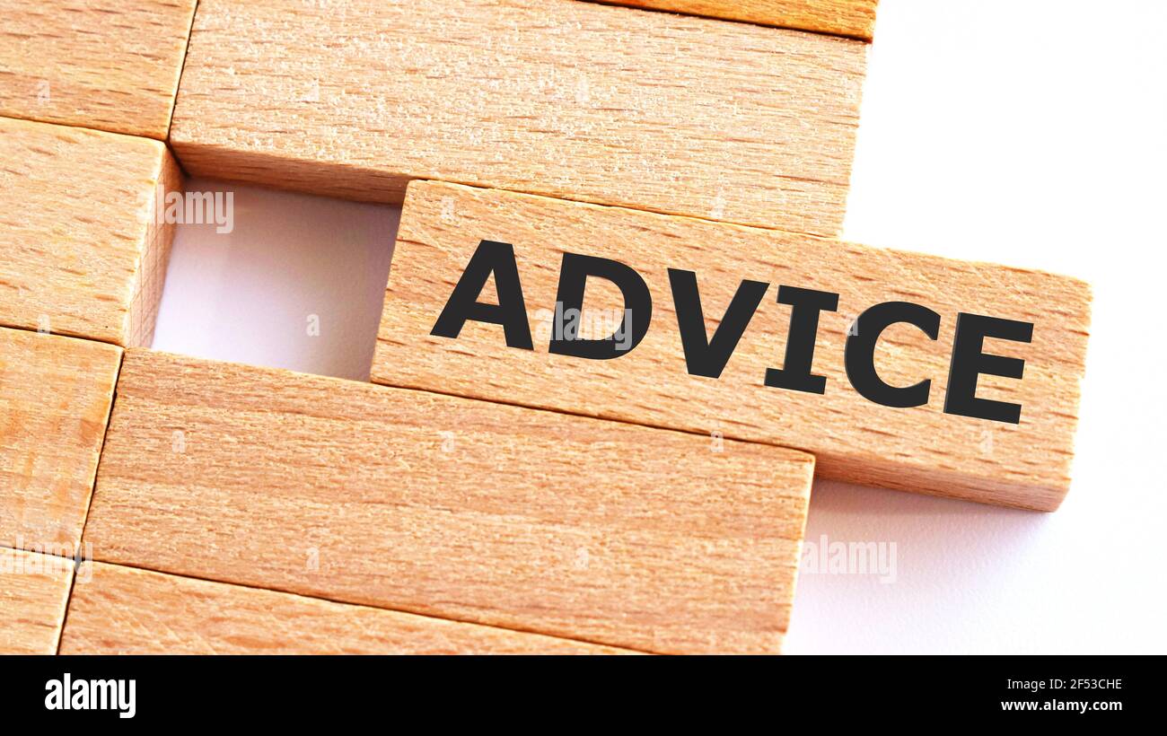 The Word - ADVICE written on wood block. Top view concept Stock Photo ...