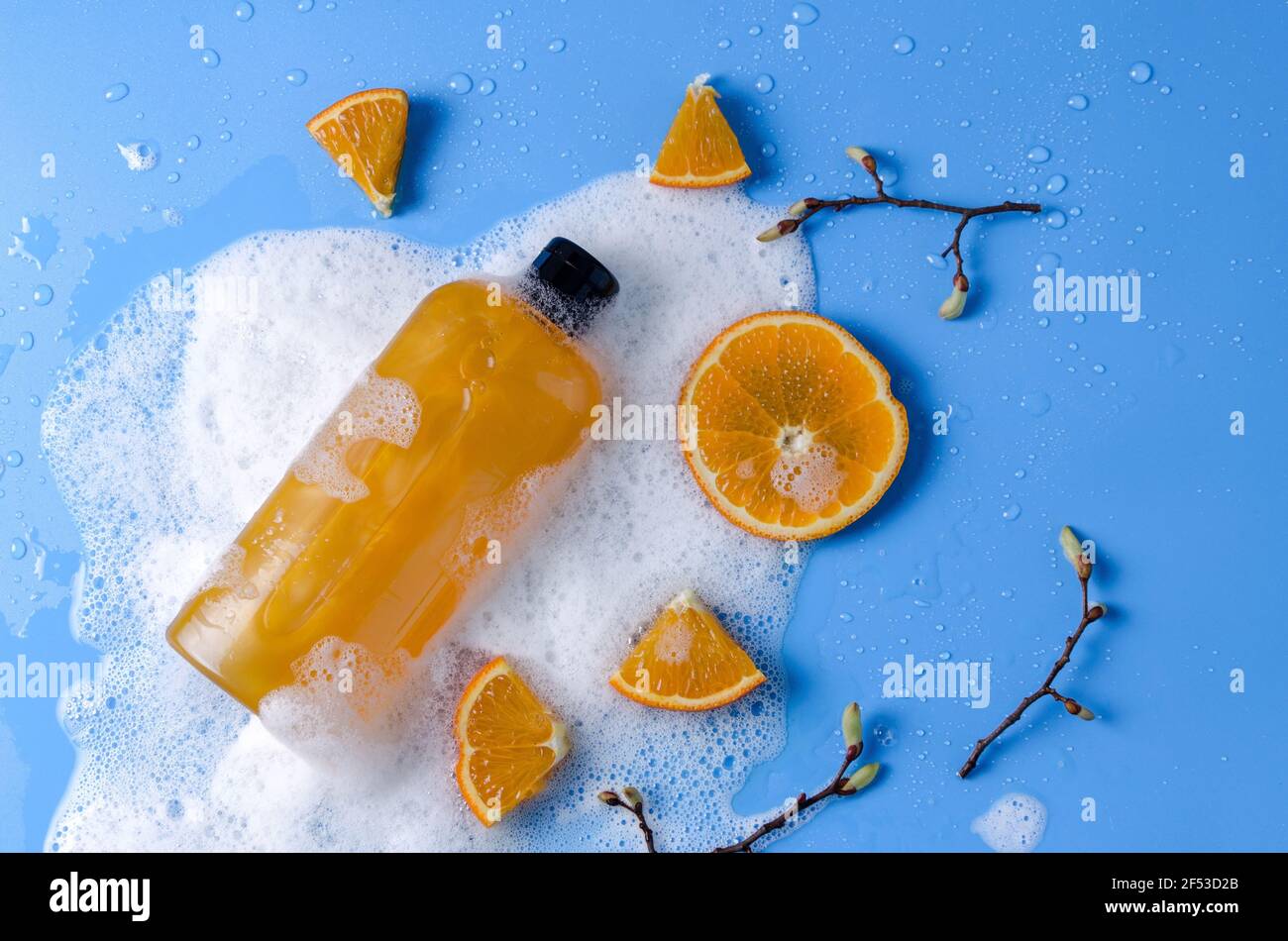 Shampoo, shower gel, orange liquid soap with natural ingredients in a ...