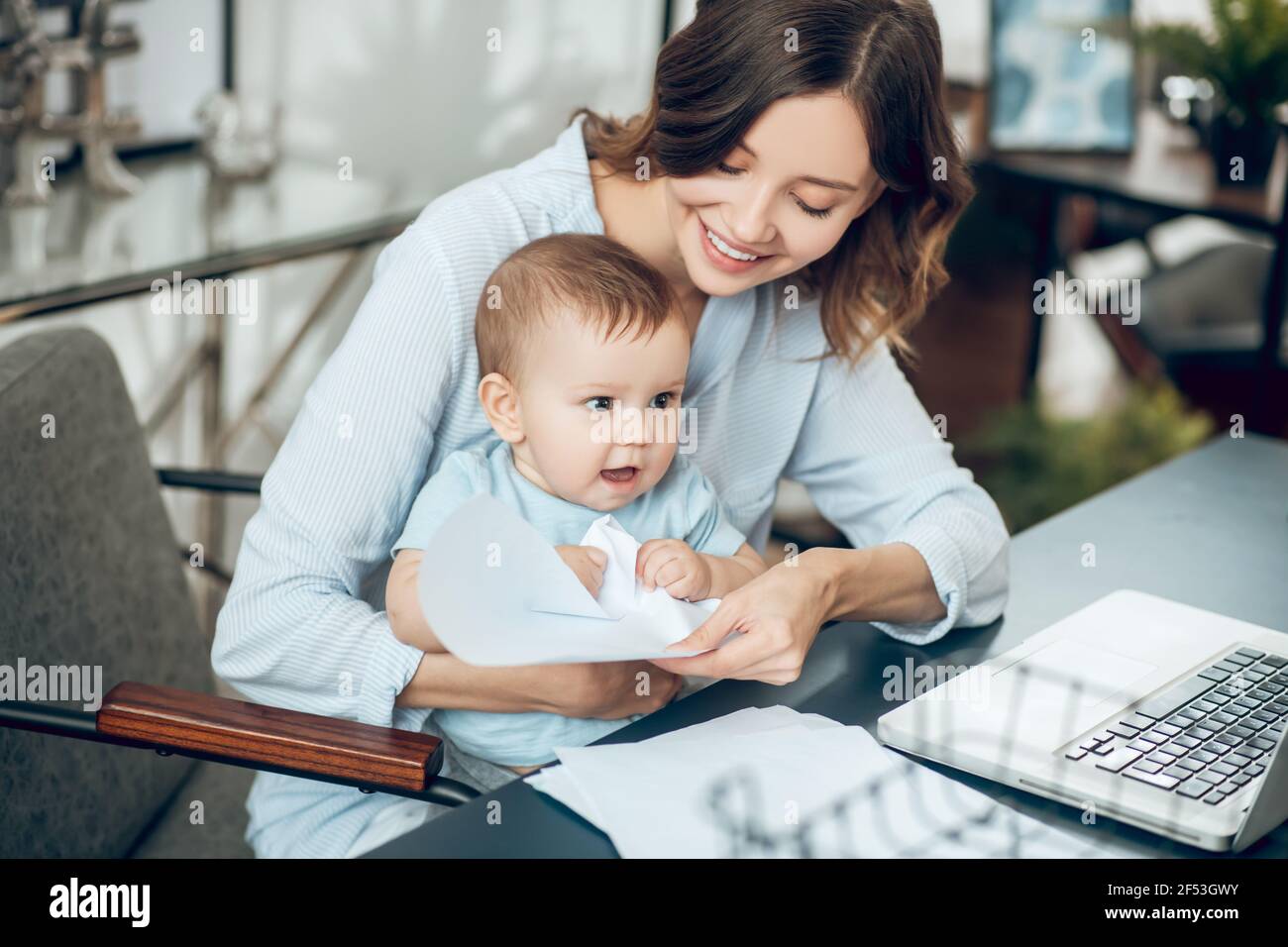 Child taking away laptop hi-res stock photography and images - Alamy