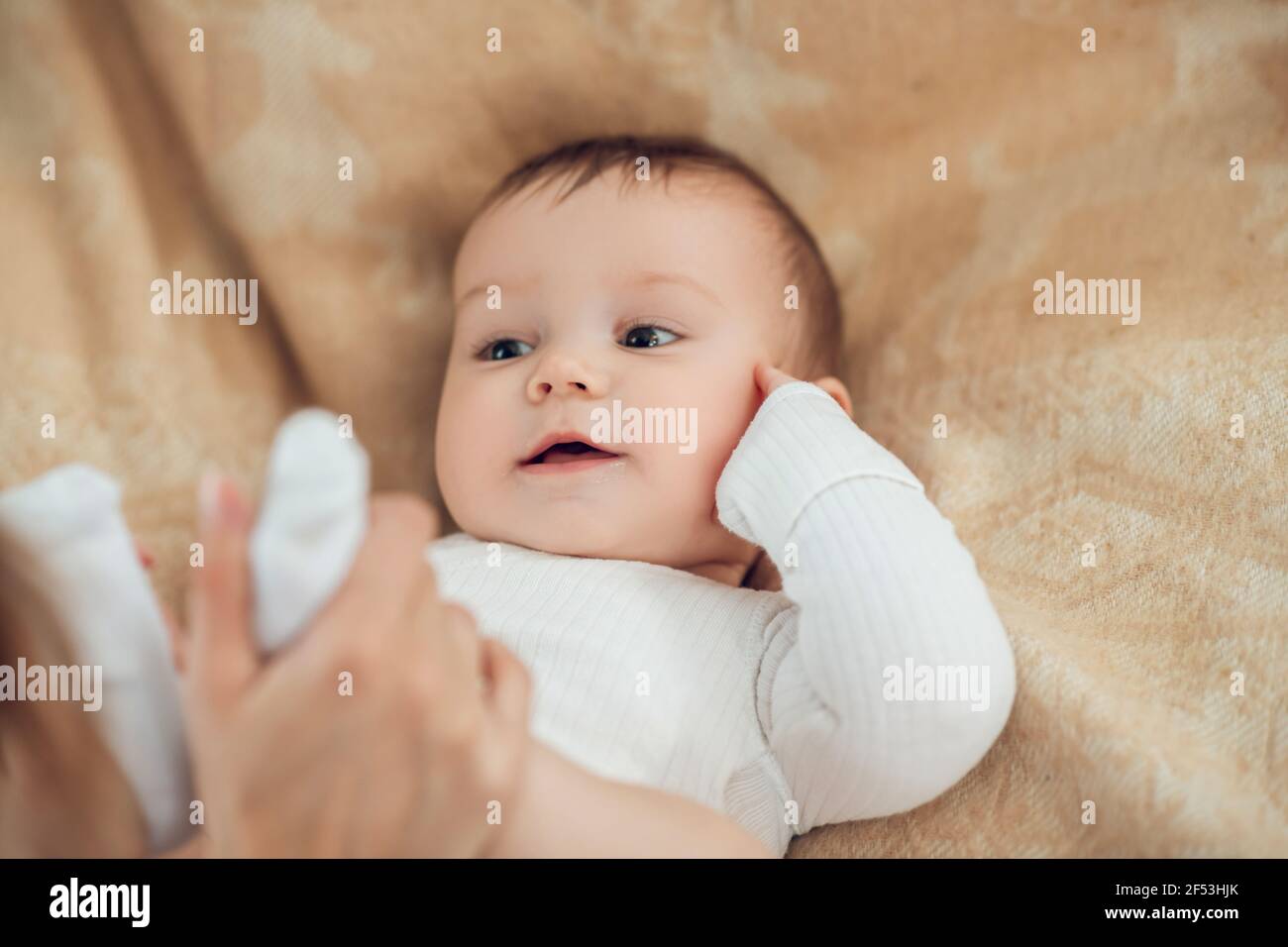 Holding moms leg hi-res stock photography and images - Alamy