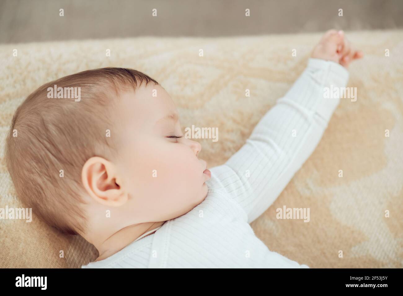 Profile of sleeping cute little baby Stock Photo - Alamy