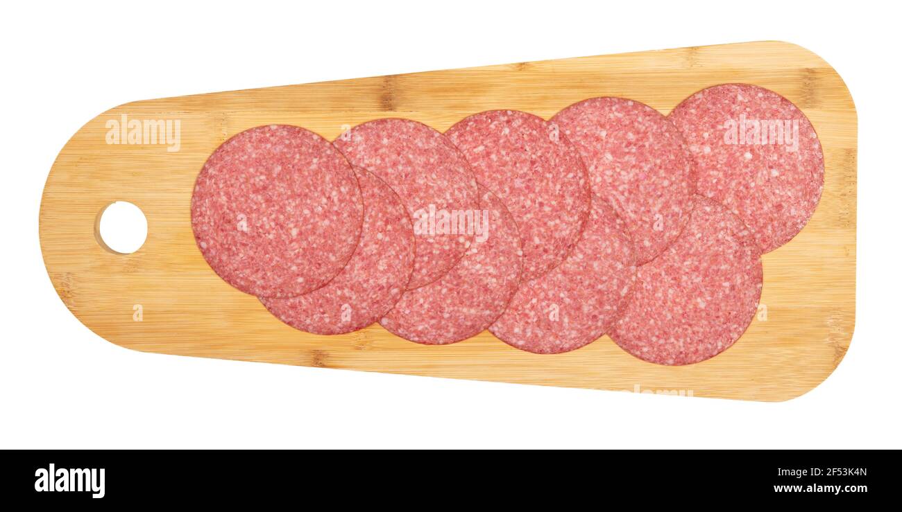 Slices of smoked sausage salami on a wooden serving tray, isolated on ...