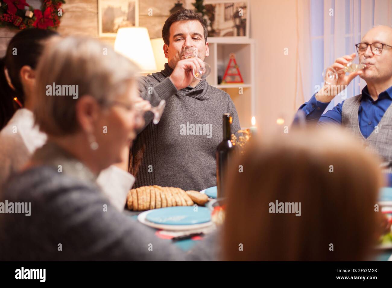 Adult drinking child christmas hi-res stock photography and images - Alamy