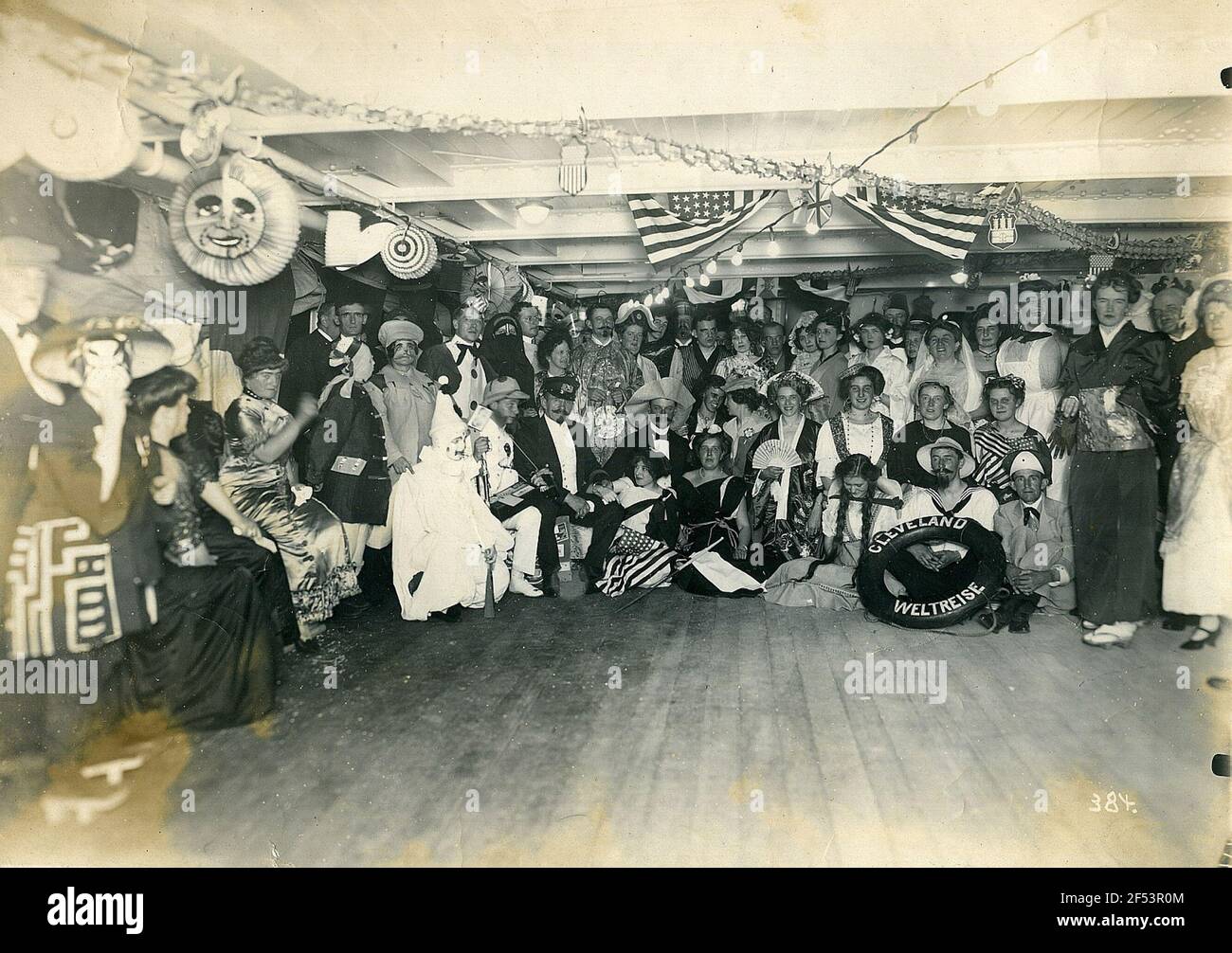 Group formation during a costume festival aboard the passenger steamer ...