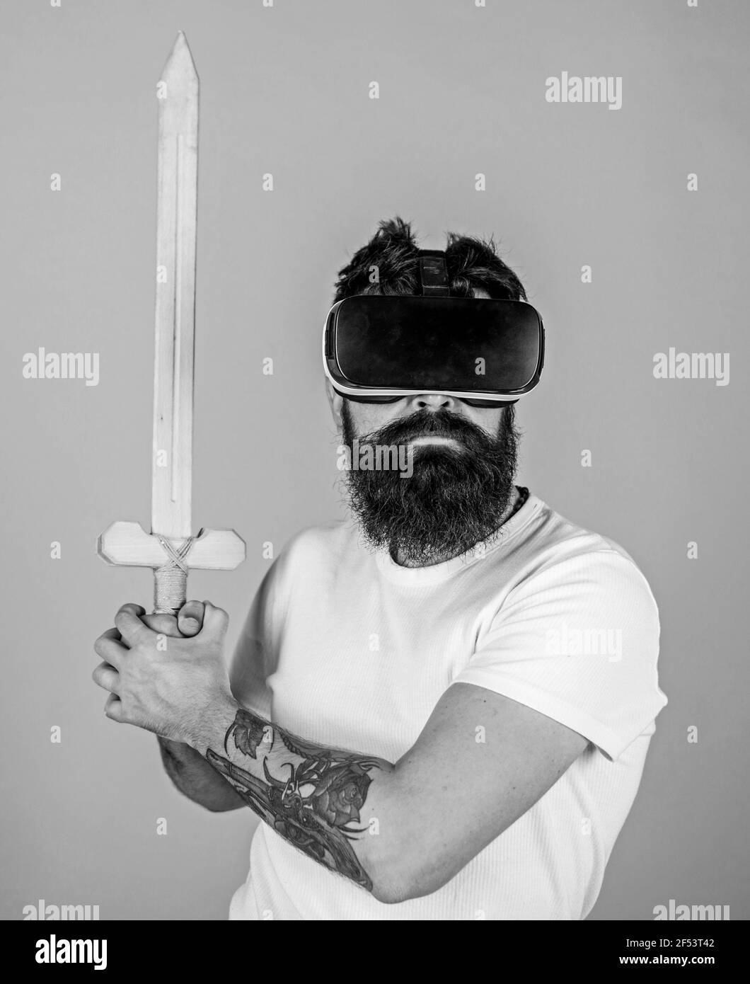 Gamer concept. Hipster on serious face enjoy play game in virtual ...