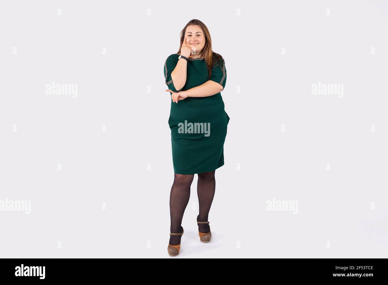 Full length photo of attractive plump woman smiling and posing happily ...