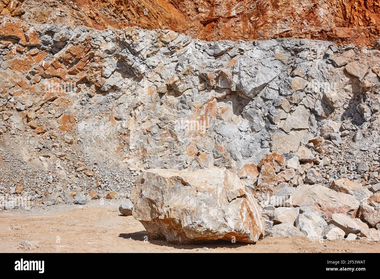 Opencast quarry. Diferent color stones. Geology mining industry. Nature ...