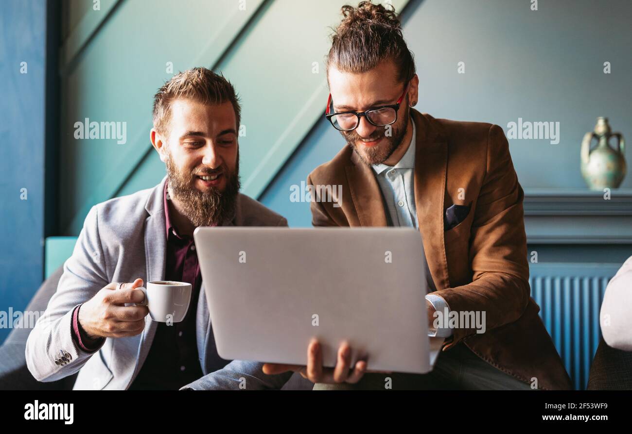 Business people, programmers cooperating at IT company developing apps Stock Photo - Alamy