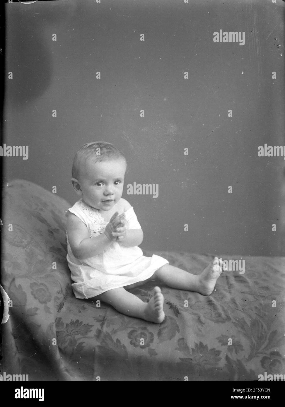 Seating child Black and White Stock Photos & Images - Alamy