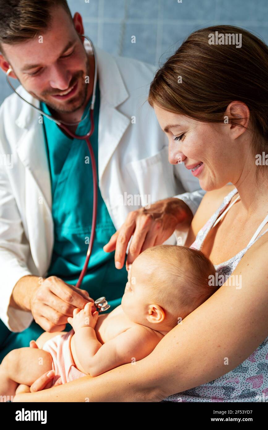 Pediatric doctor exams little baby. Health care, medical examination ...