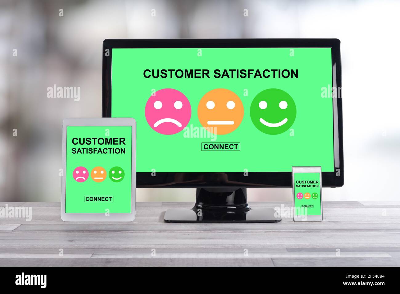 Customer satisfaction concept shown on different information technology ...