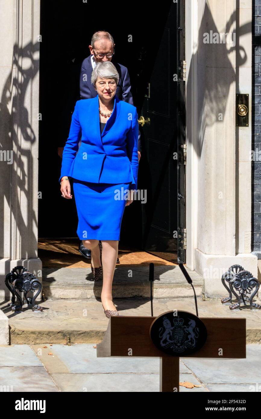 British Prime Minister Theresa May steps out of 10 Downing Street with ...