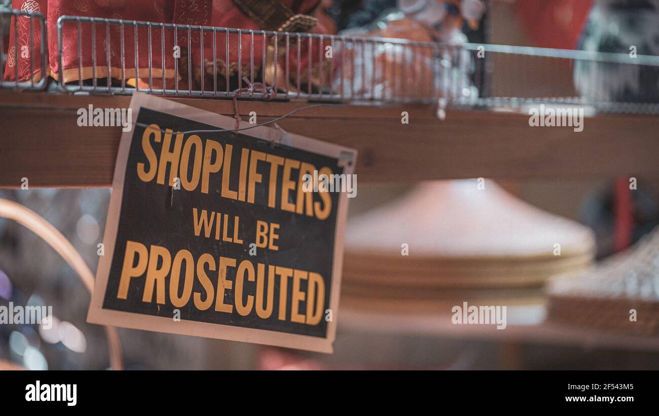 Sign warning shoplifters hi-res stock photography and images - Alamy