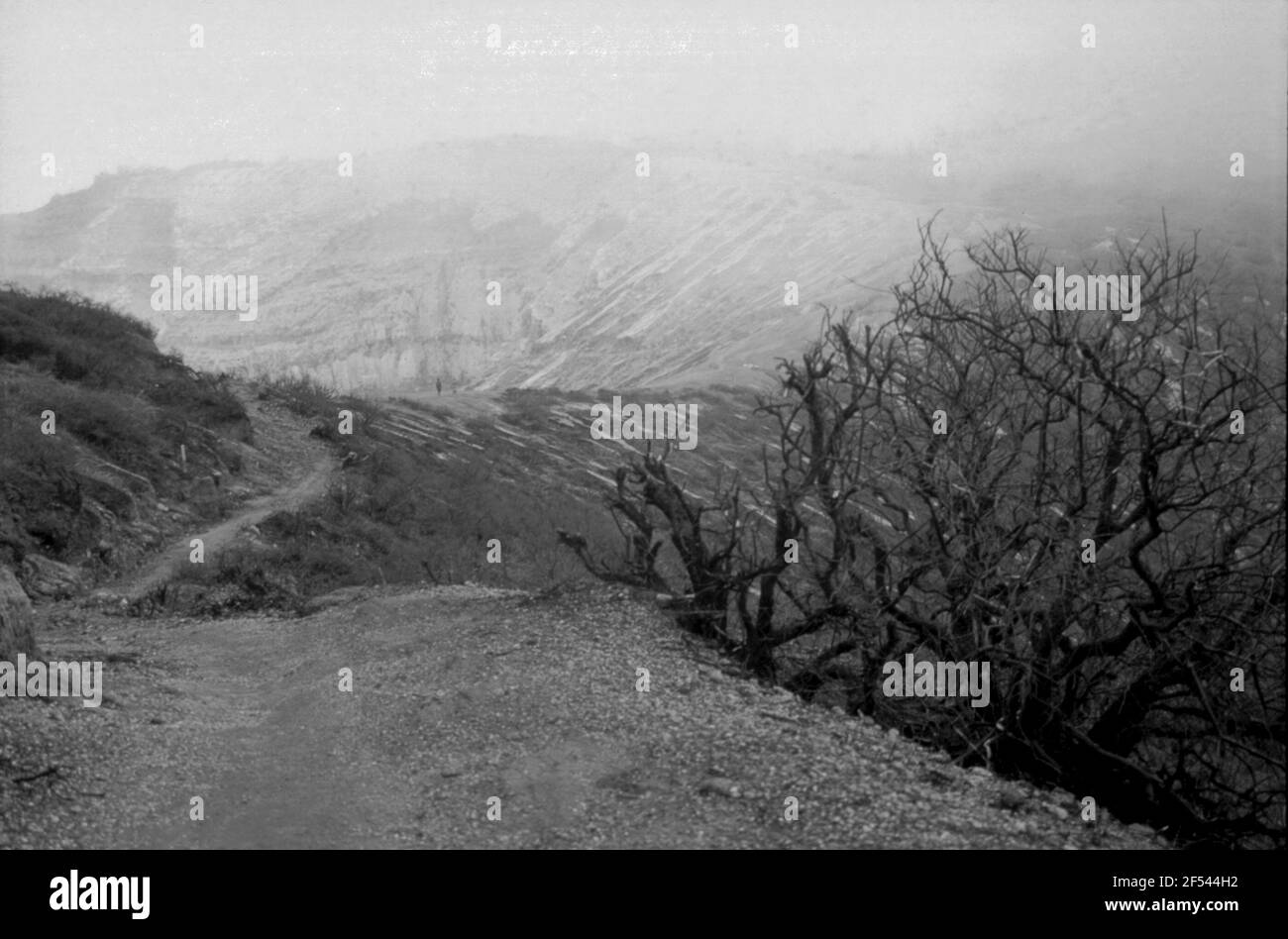 The caldera of Mount Ijen volcano is seen from the main trail. Mount ...