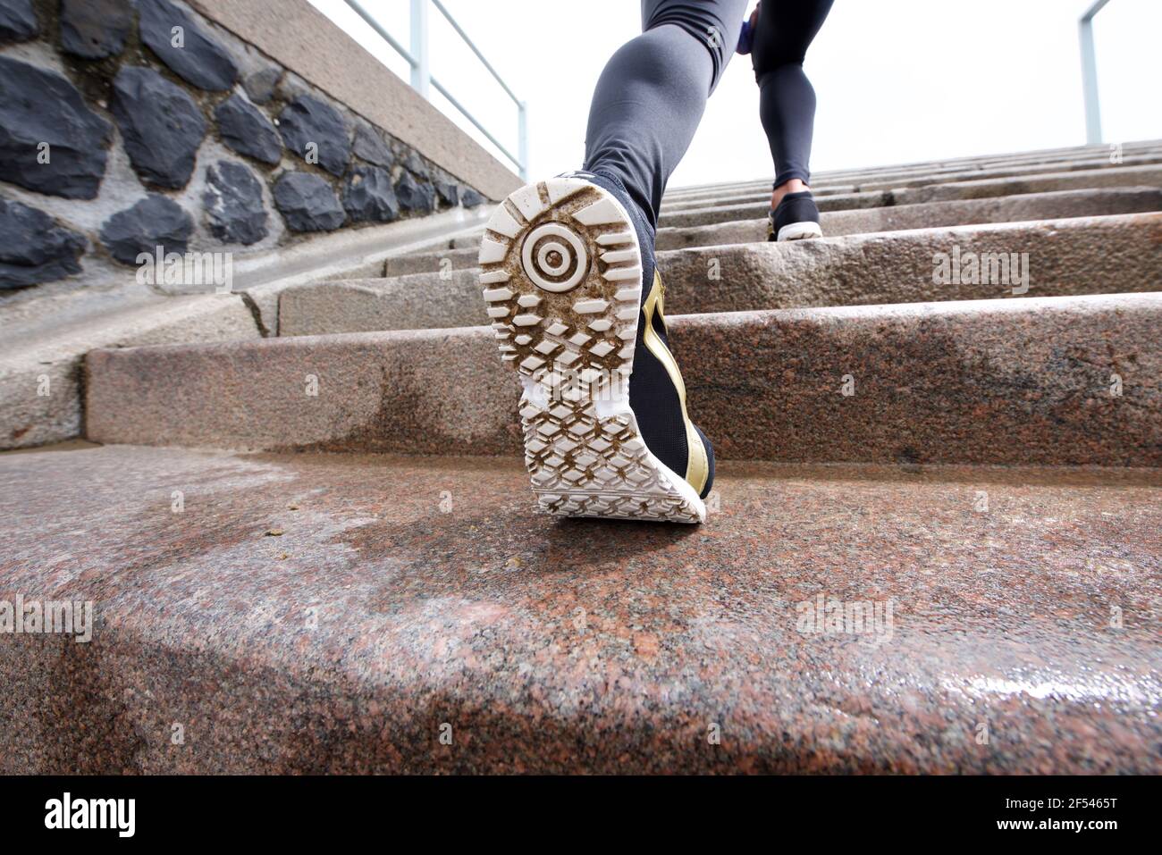 Female runner back low angle hi-res stock photography and images - Alamy