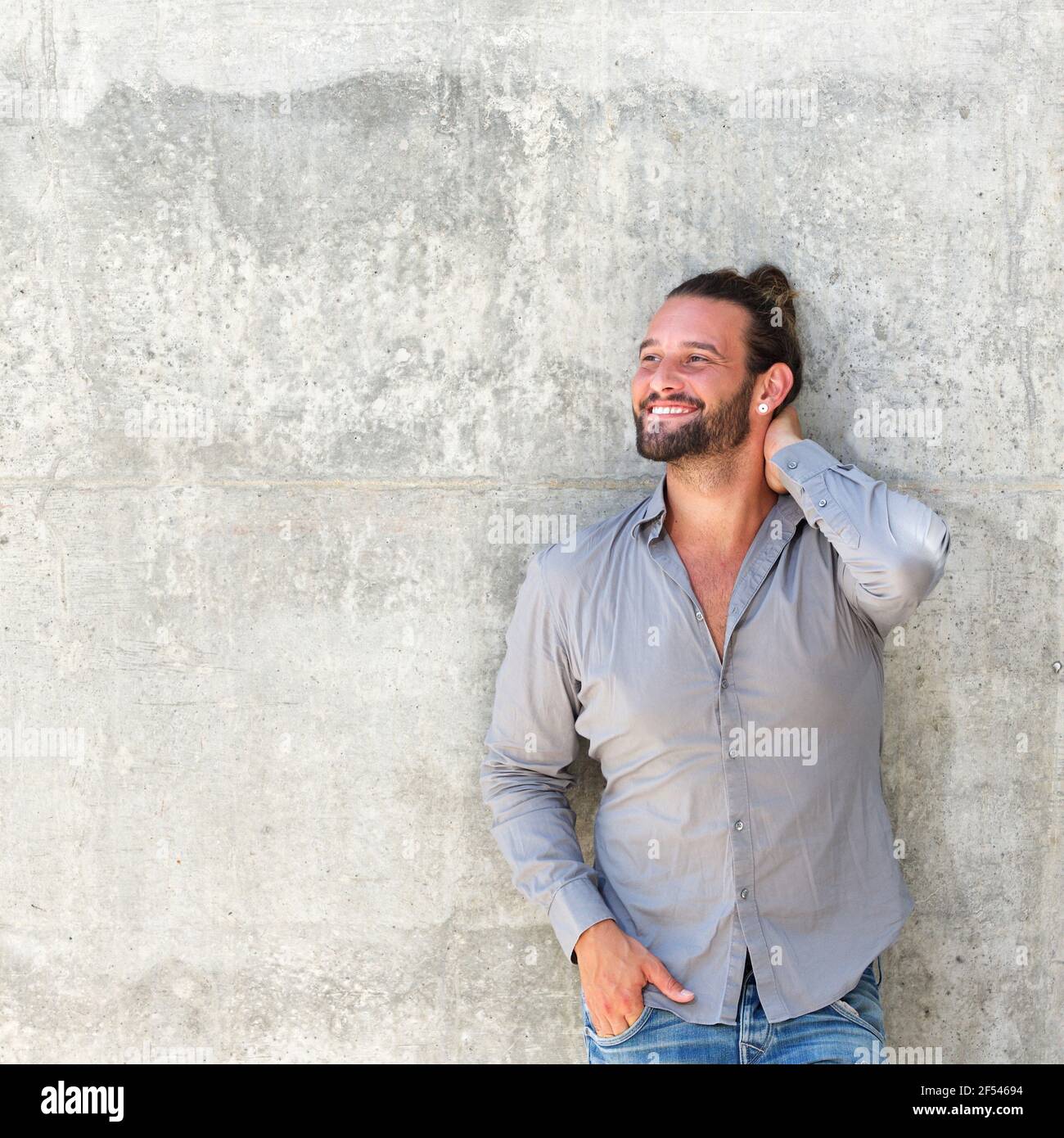 Portrait of handsome modern man with beard smiling Stock Photo - Alamy