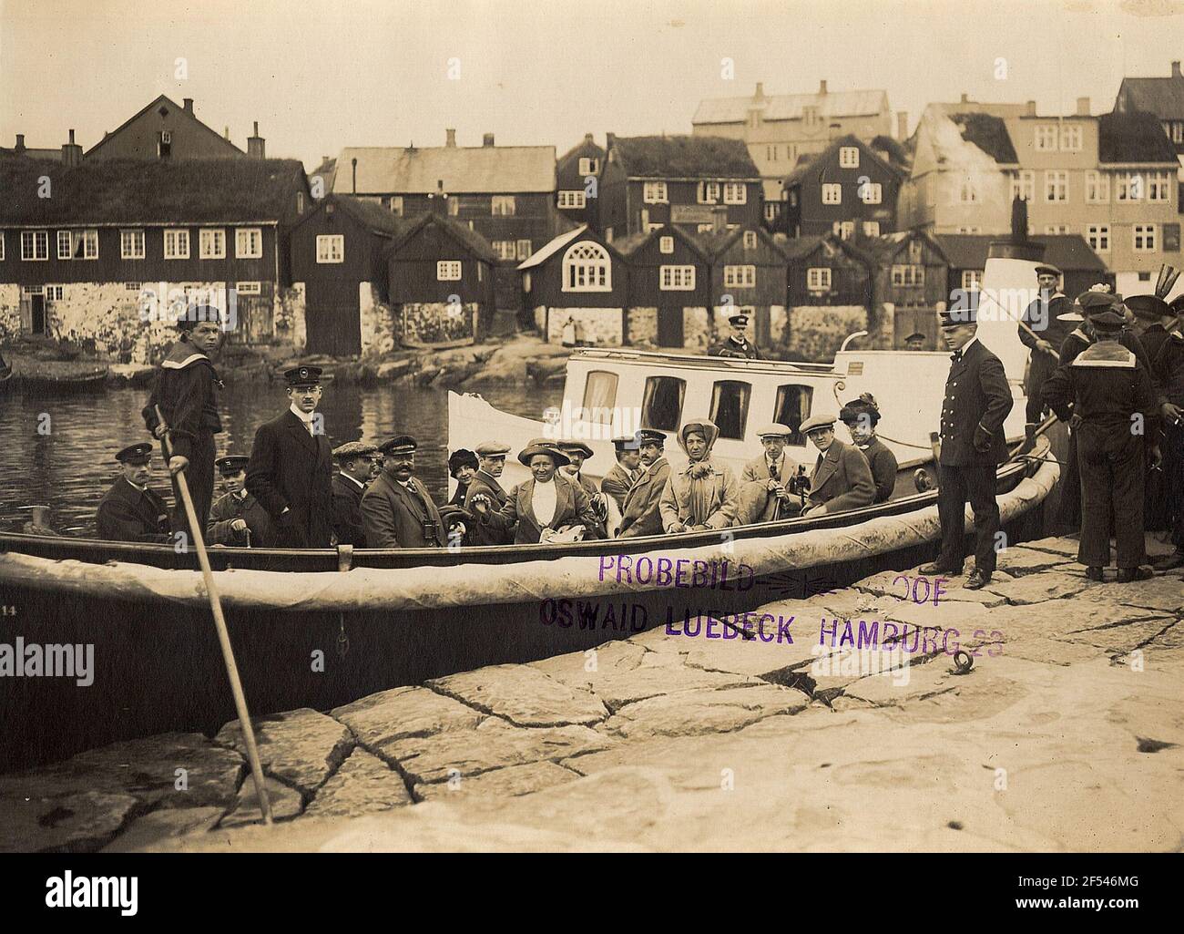 Thorshaven, Faroe Islands / Denmark: Tourists at the outboats in rescue ...