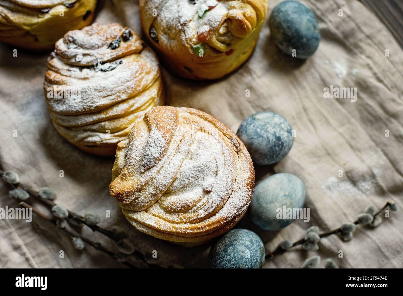 Traditional cupcake Easter cake kraffin with raisins on dark wooden ...