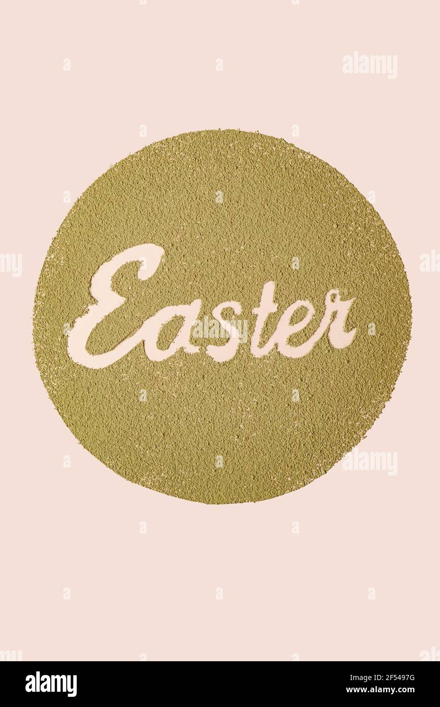 The inscription Easter in a round frame from matcha tea. Spring ...