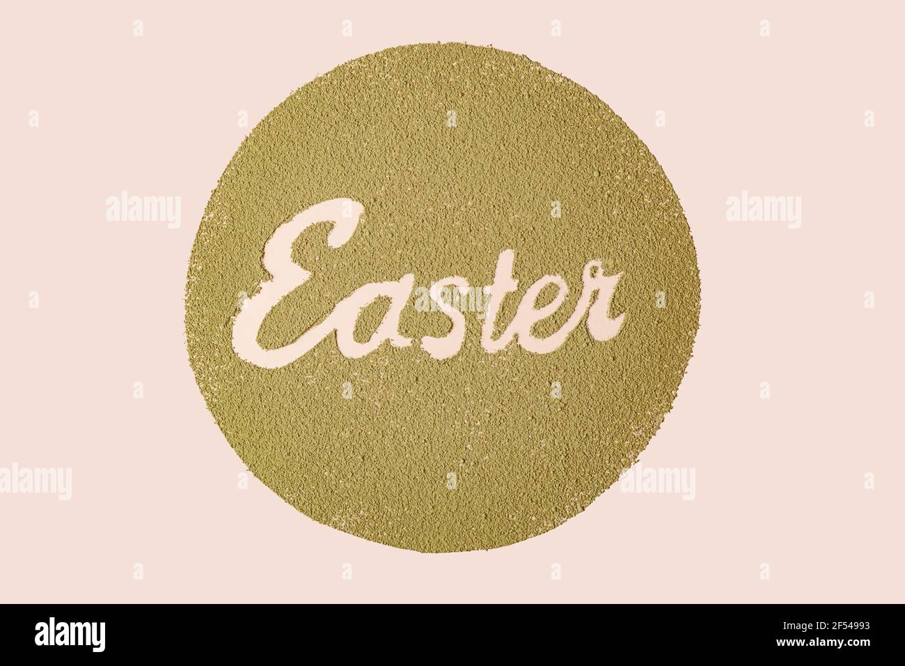 The inscription Easter in a round frame from matcha tea. Spring ...