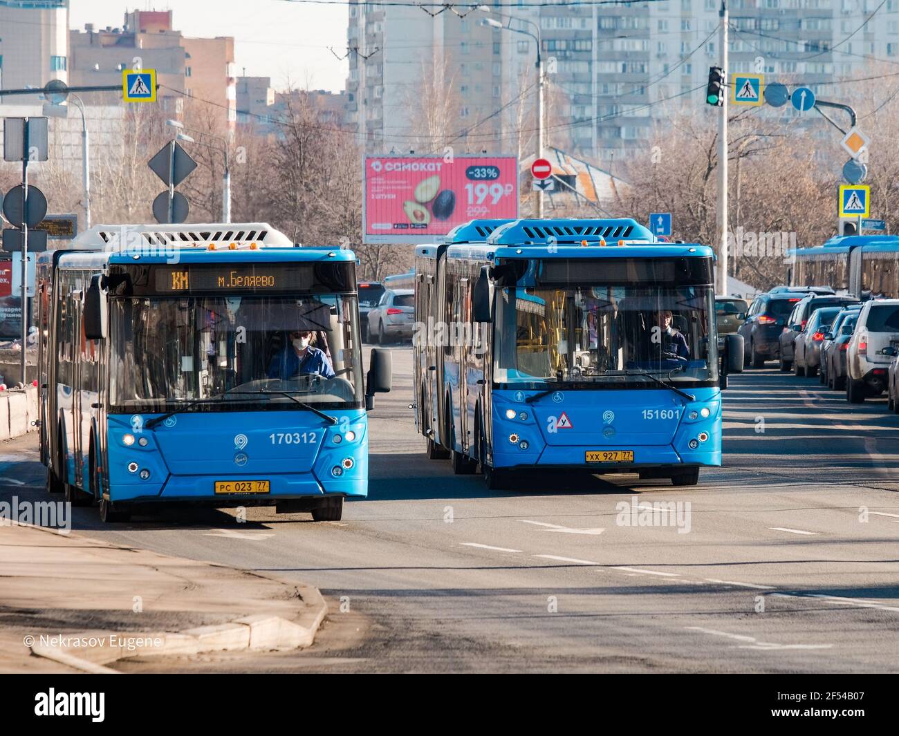 Moscow. Russia. March 24, 2021. Modern blue buses on the city street on ...