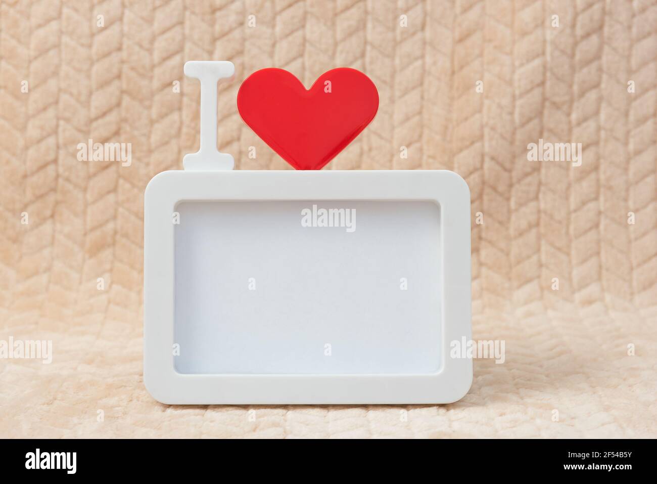 Cute empty white frame without photo Stock Photo - Alamy