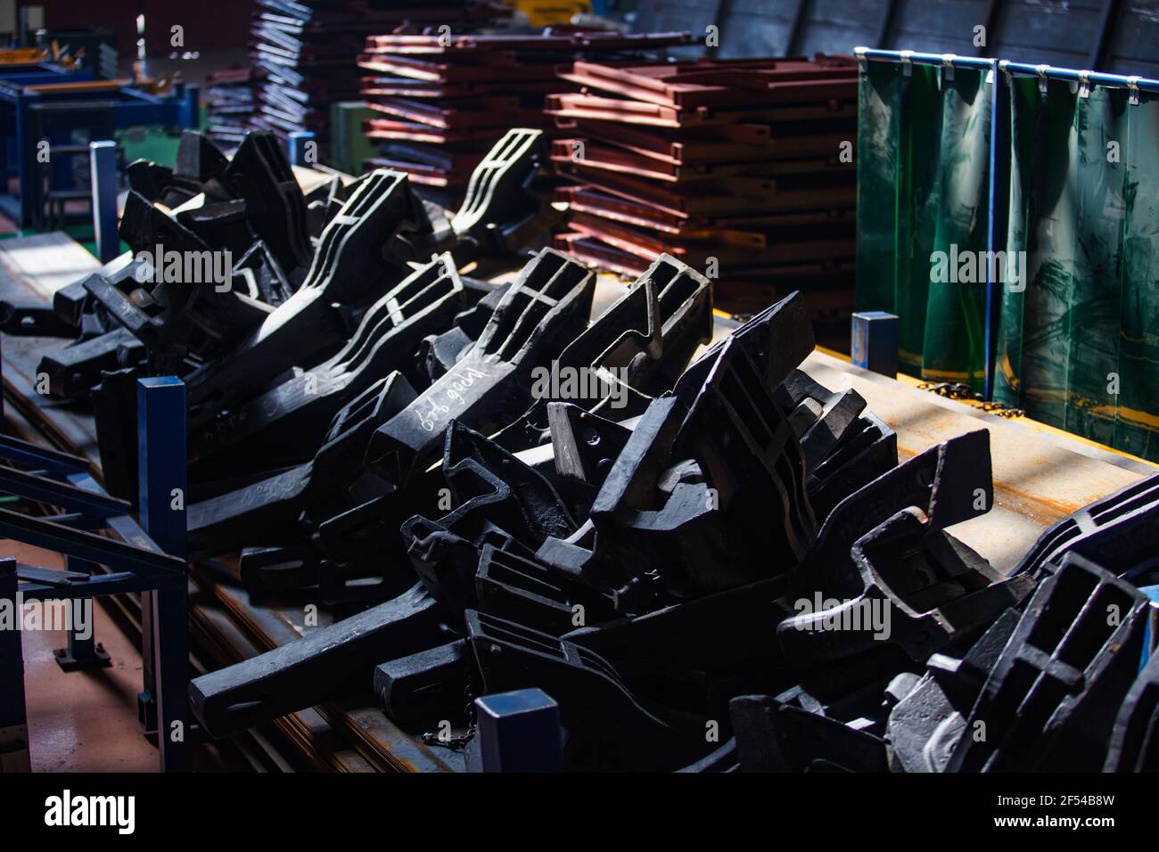 Train car-building plant. Black steel car drawbars. Ekibastuz, Pavlodar ...