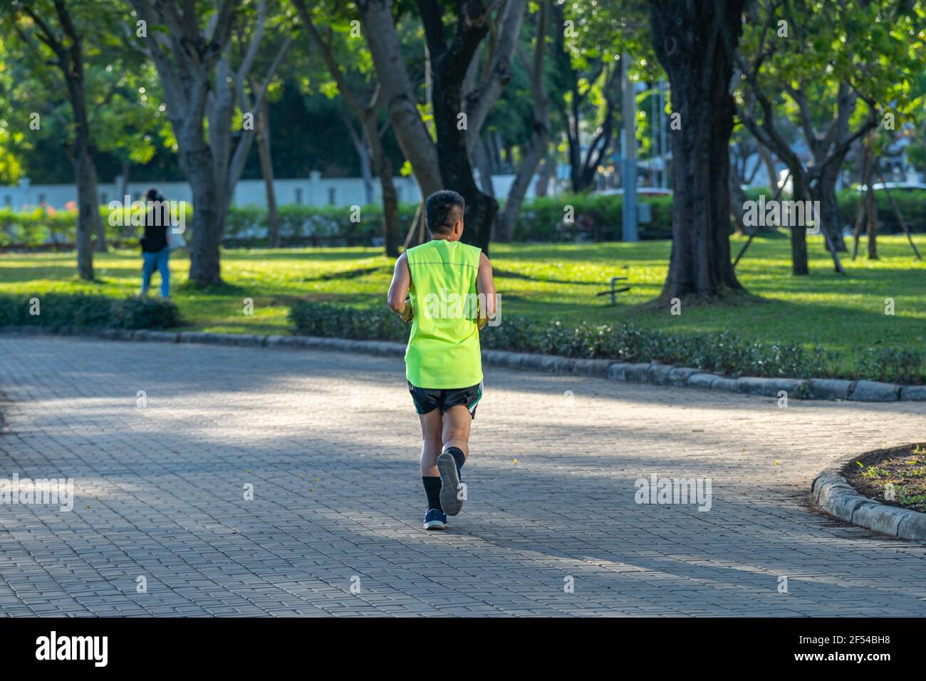 Asian man jogging hi-res stock photography and images - Alamy