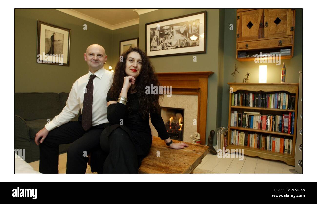 Azita and Mark Horwood in their home in Surbiton, Londonpic David ...