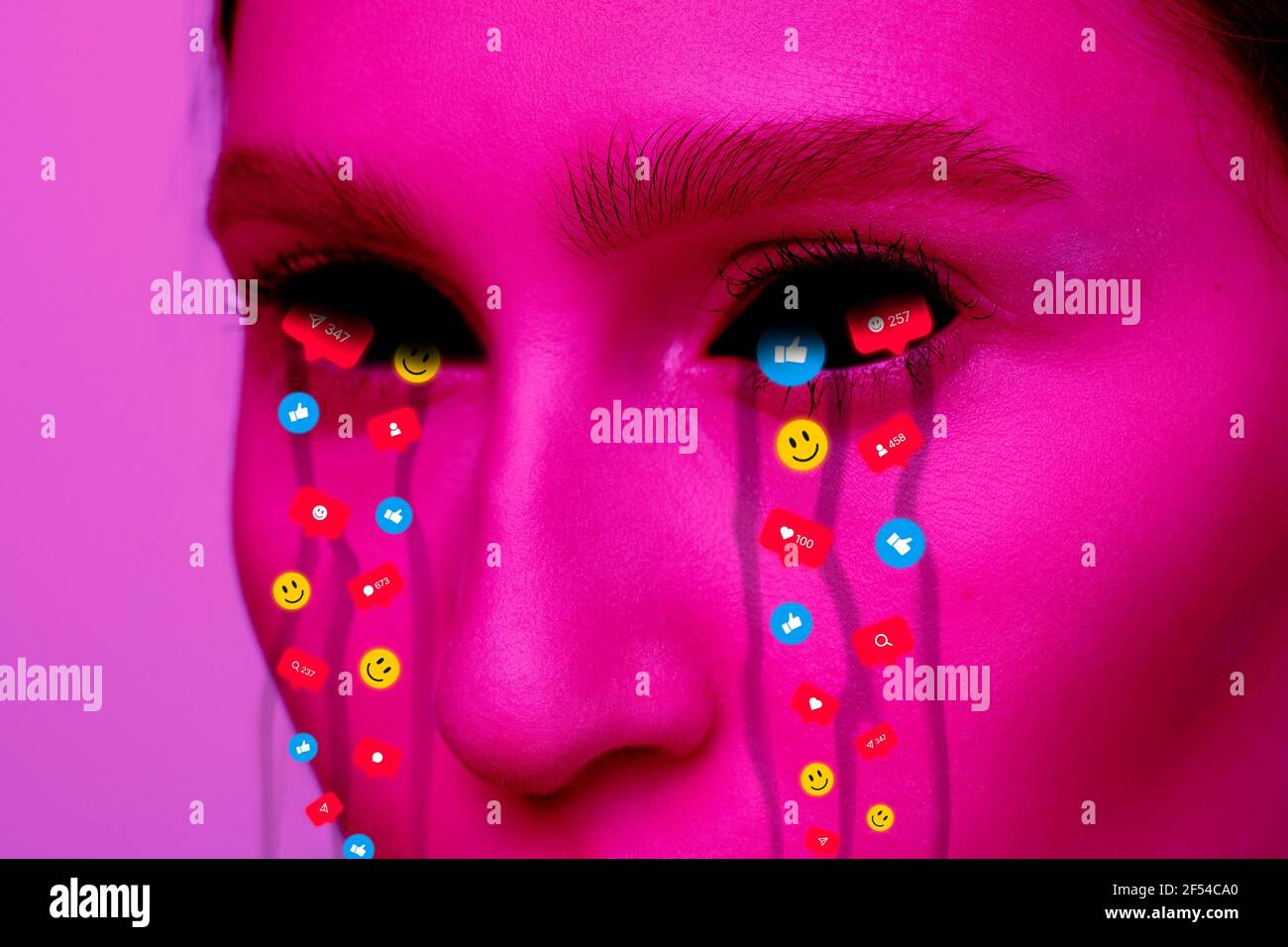 Tears illustrated of social media activity signs on female face in neon ...