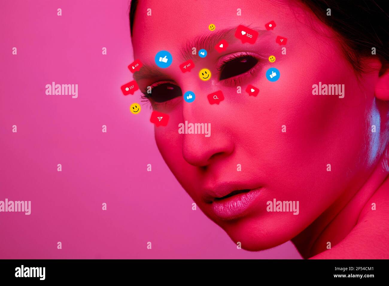 Tears illustrated of social media activity signs on female face in neon ...