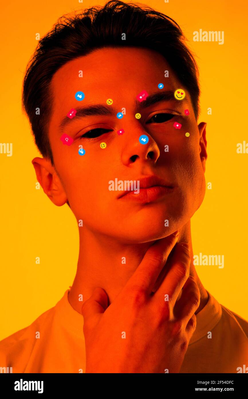 Tears illustrated of social media activity signs on male face in neon ...