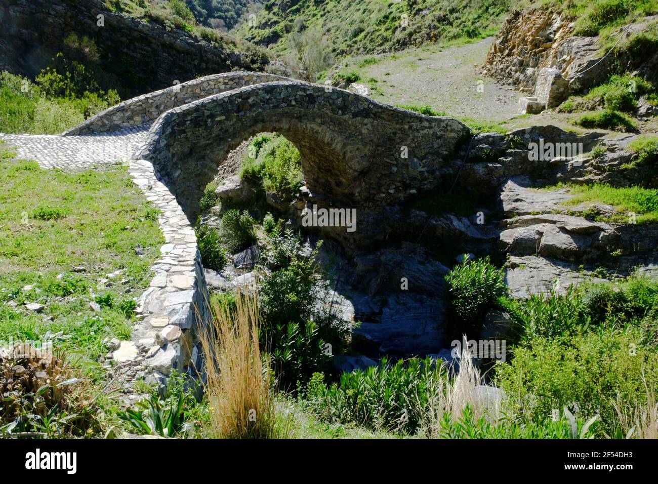The roman bridge near the village of Sedella, Axarquia, Andalucia ...