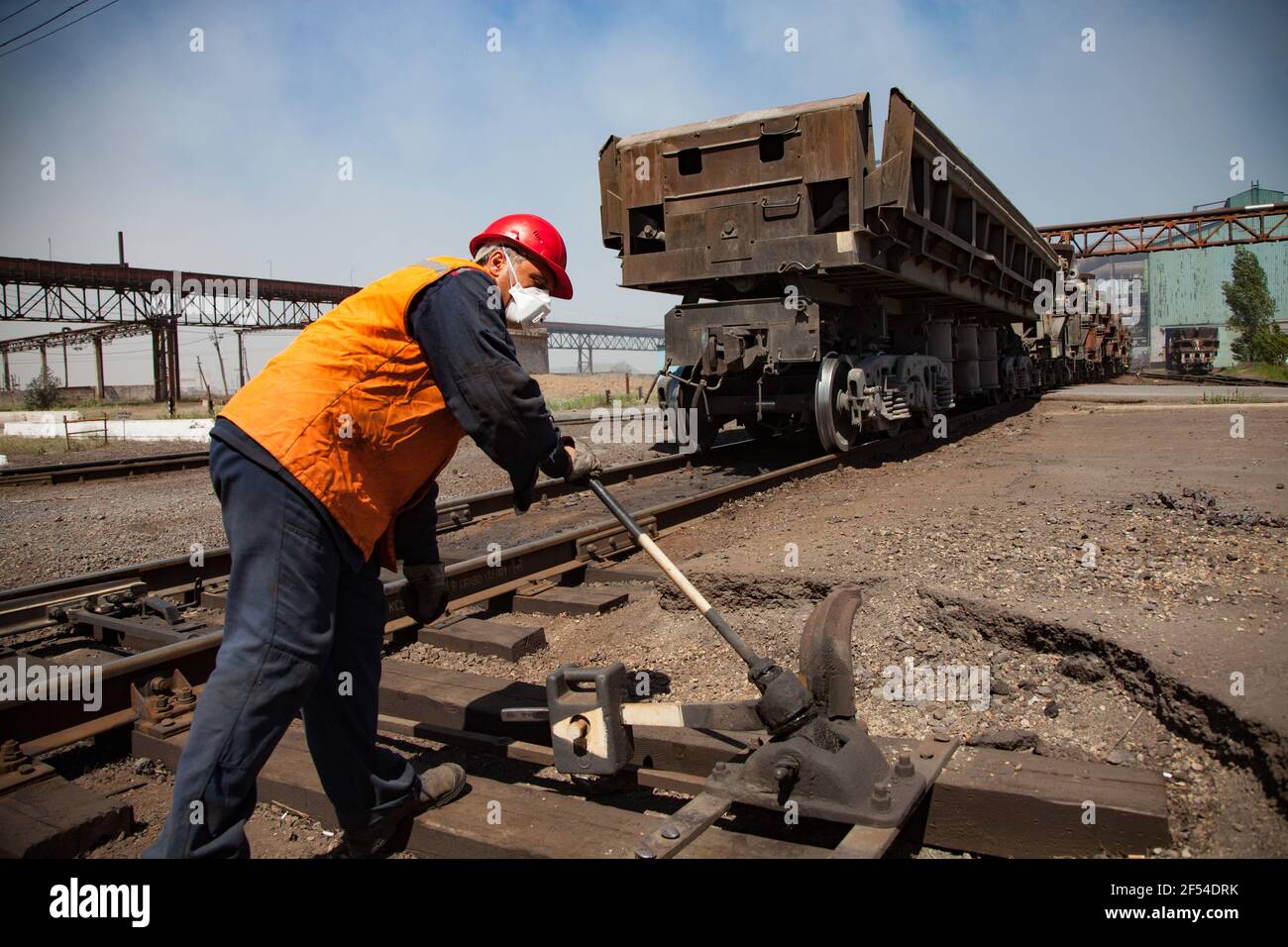 Aksu, Pavlodar region, Kazakhstan - May 29 2012: Railroad switchman in ...