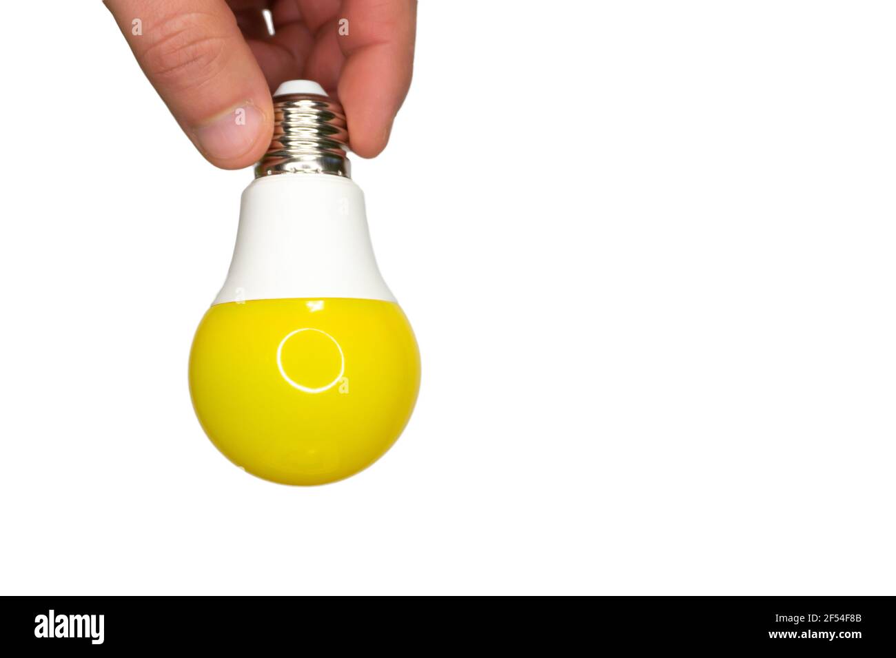 modern yellow led lamp in hand on white background Stock Photo - Alamy