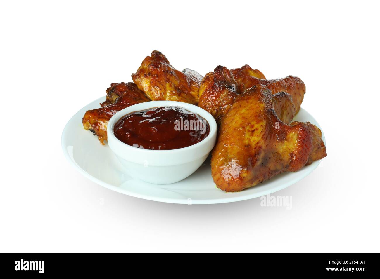 Baked chicken wings with sauce isolated on white background Stock Photo ...