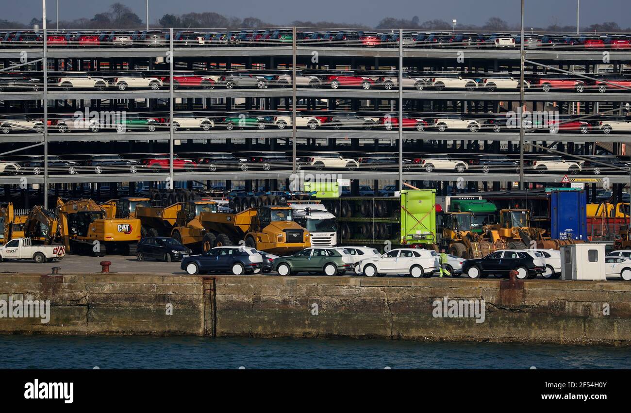 Cars sit on the dock side of the Port of Southampton in Hampshire ...