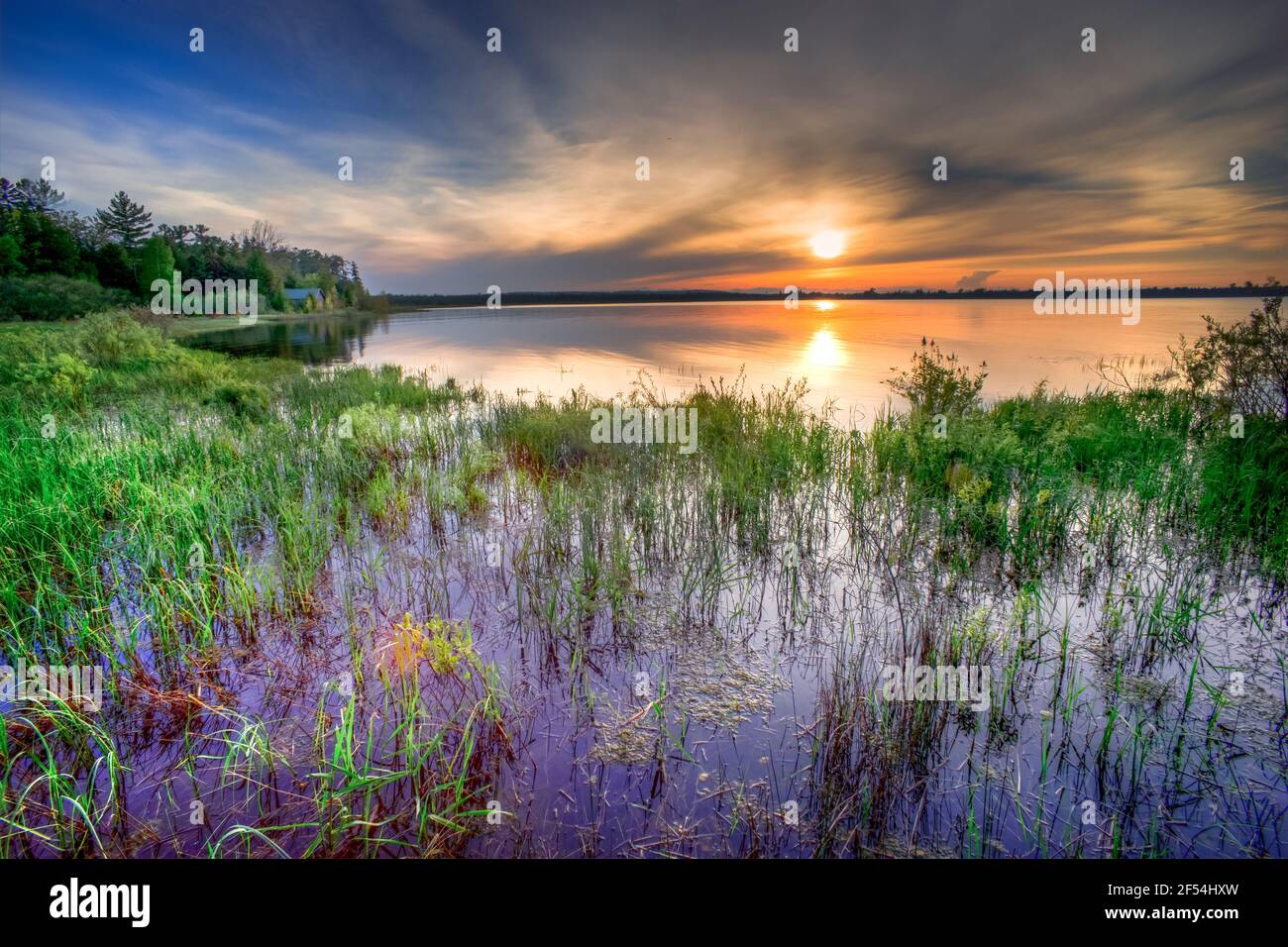 A spring sunset captured on Moonlight bay near Baileys Harbor in Door ...