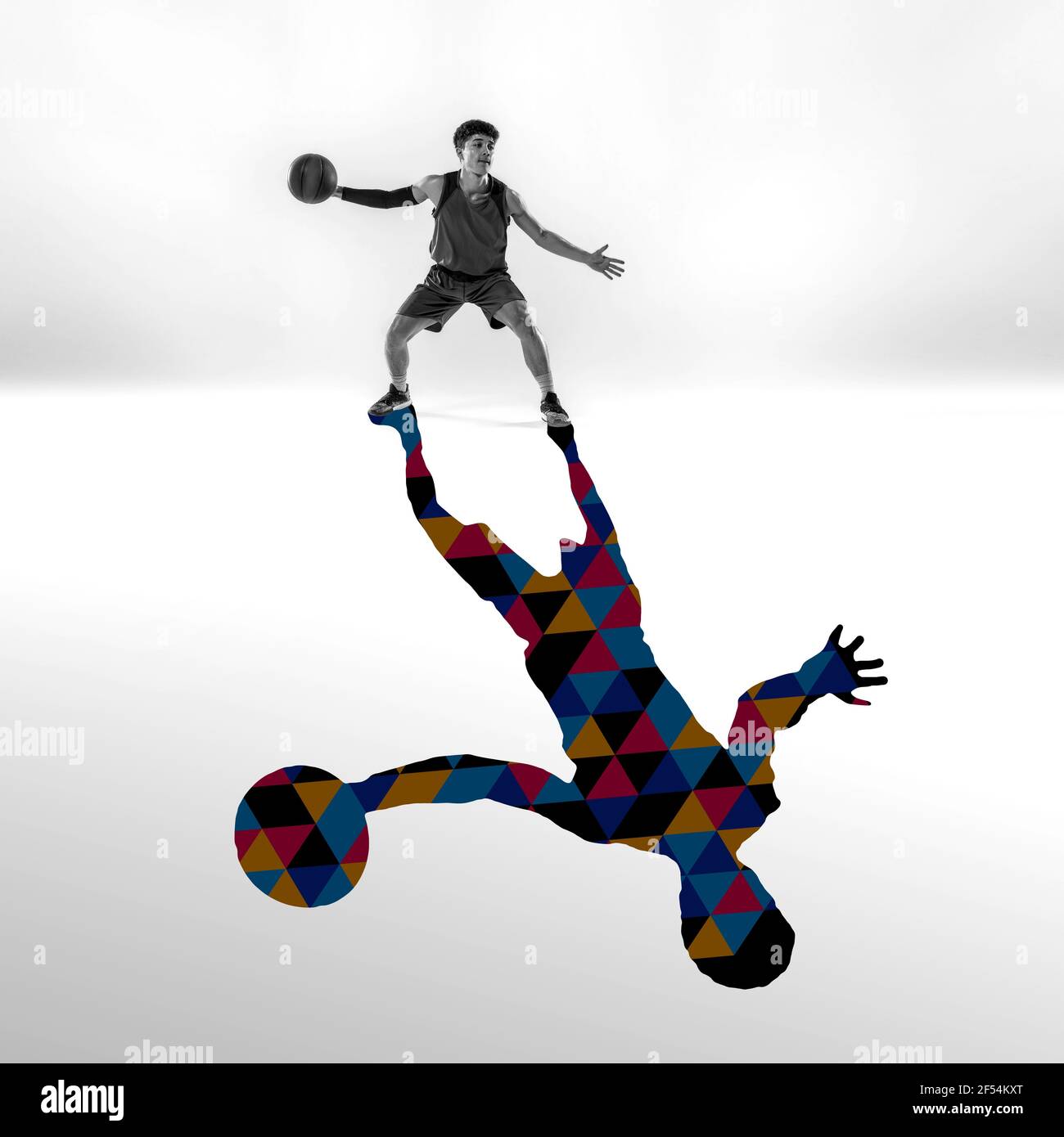 Young caucasian sportsman isolated on studio background with shadow ...