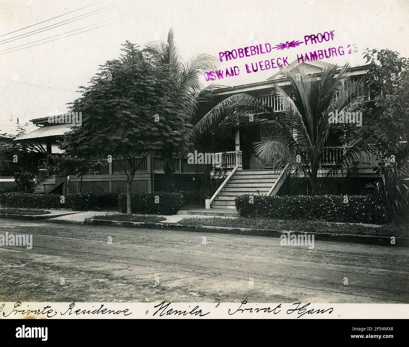 Manila, Philippines. View of a private house with terrace and palm ...