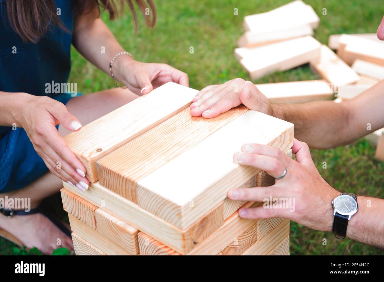 Giant Outdoor Block Game game on the green grass Stock Photo - Alamy