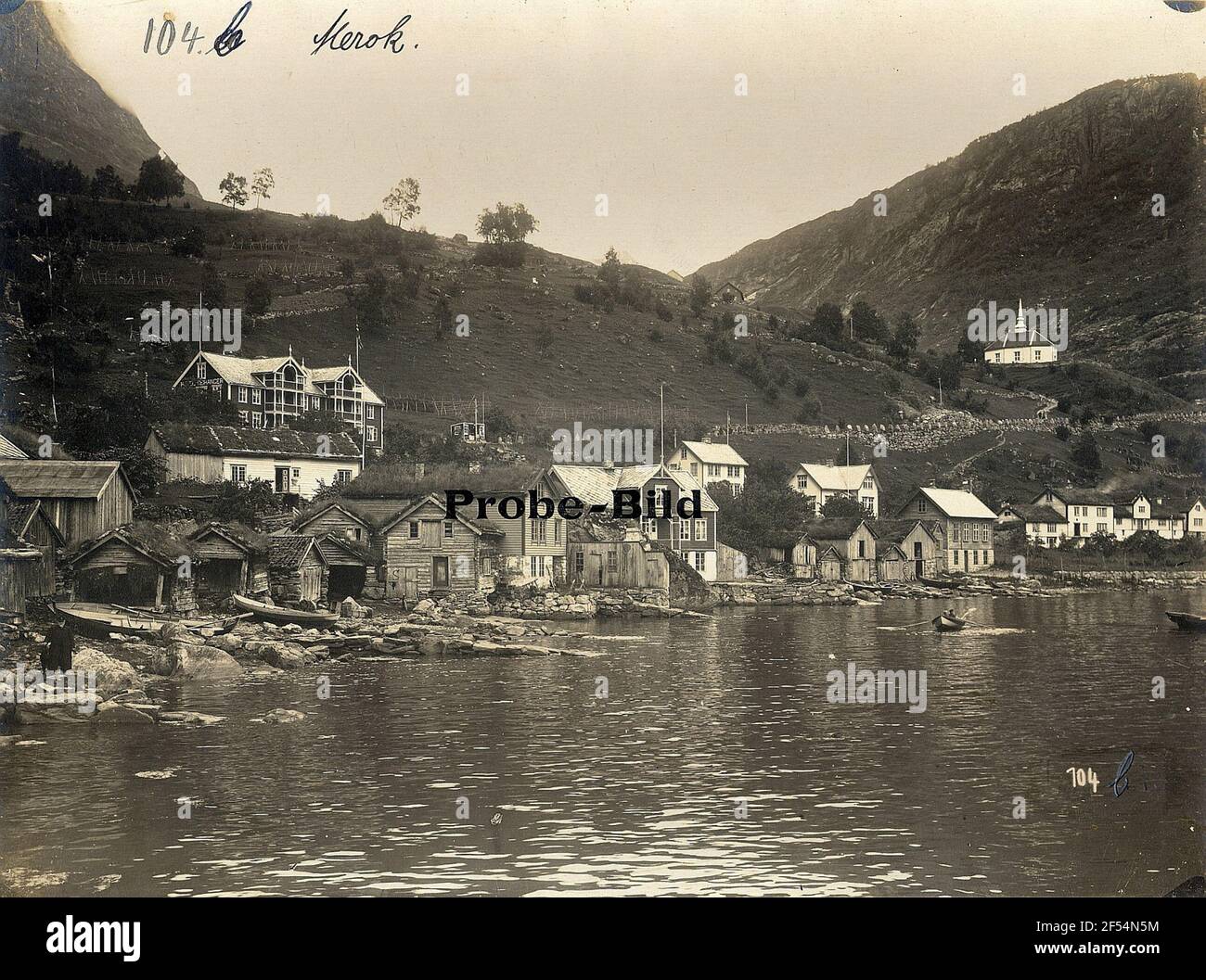 Merok / Norway: Bay with wooden huts and fishing boats Stock Photo - Alamy