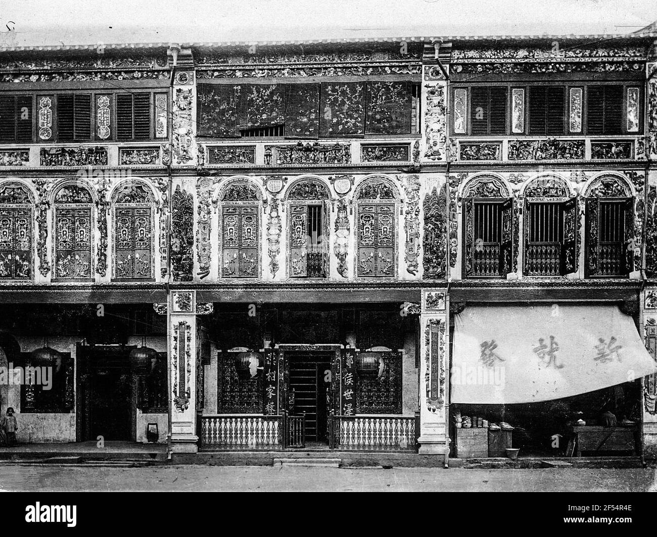Shanghai. Facade of a historic building with three entrances, right ...