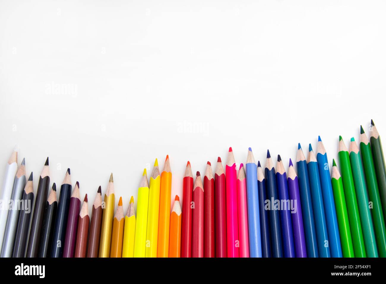 Colorful pencils on white background Stock Photo - Alamy