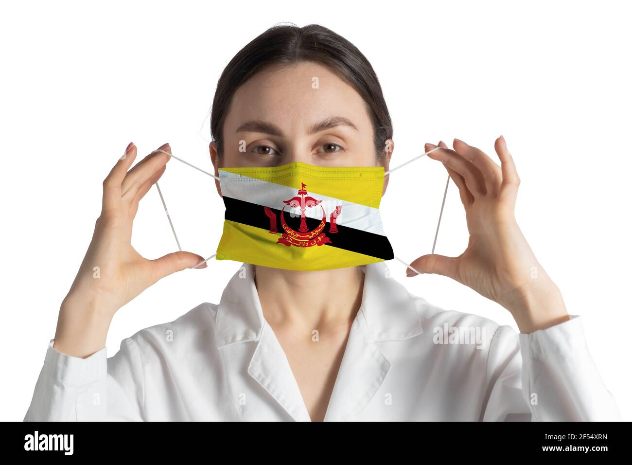 Respirator with flag of Brunei Doctor puts on medical face mask ...