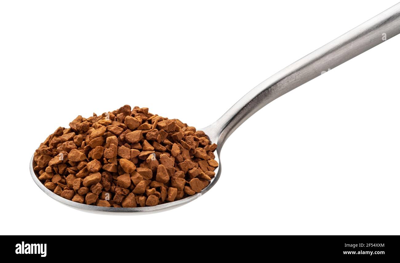 Instant coffee in spoon isolated on white background Stock Photo - Alamy