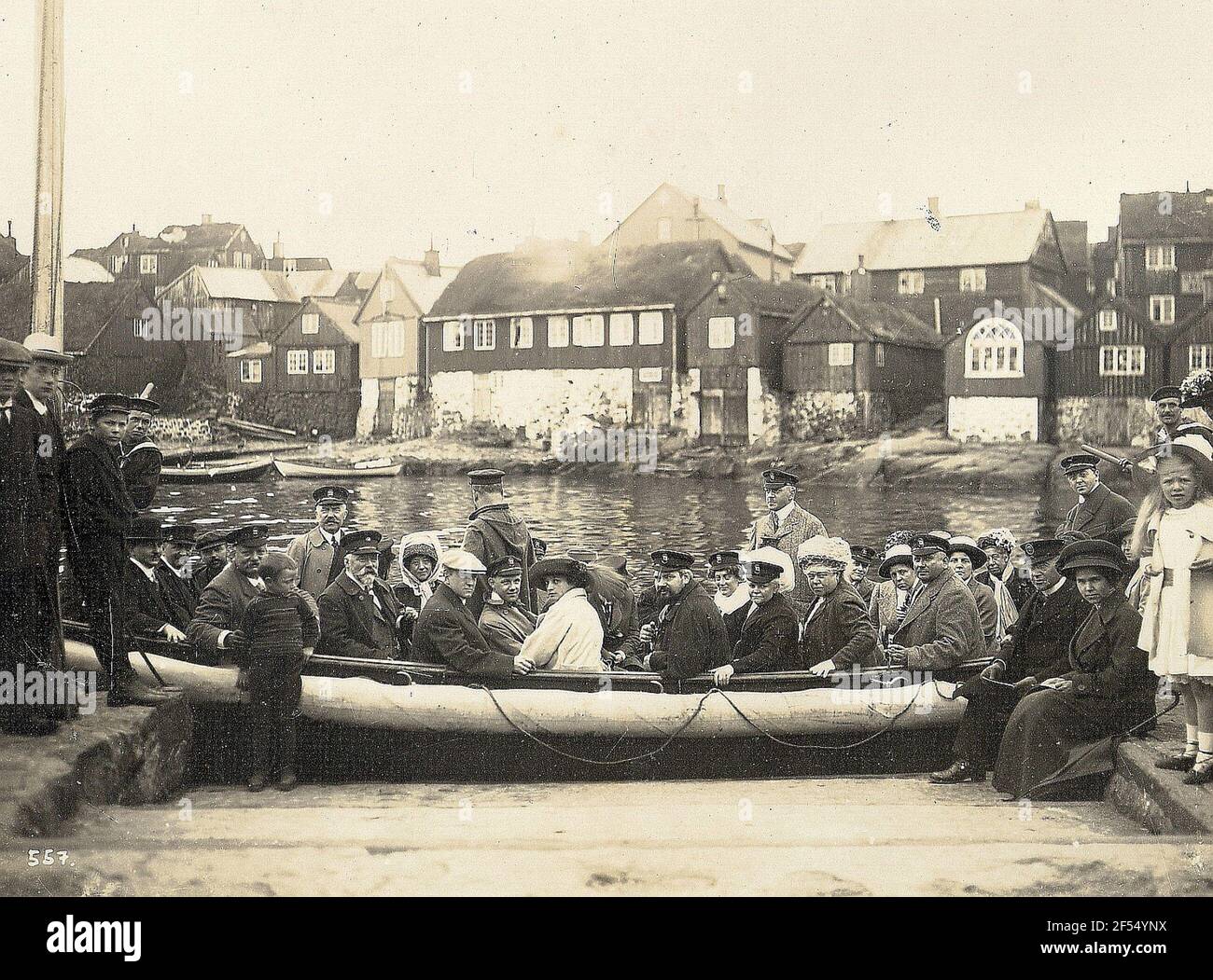 Thorshavn / Faroe Islands (Denmark). Port. Tourists sitting in a rowing ...