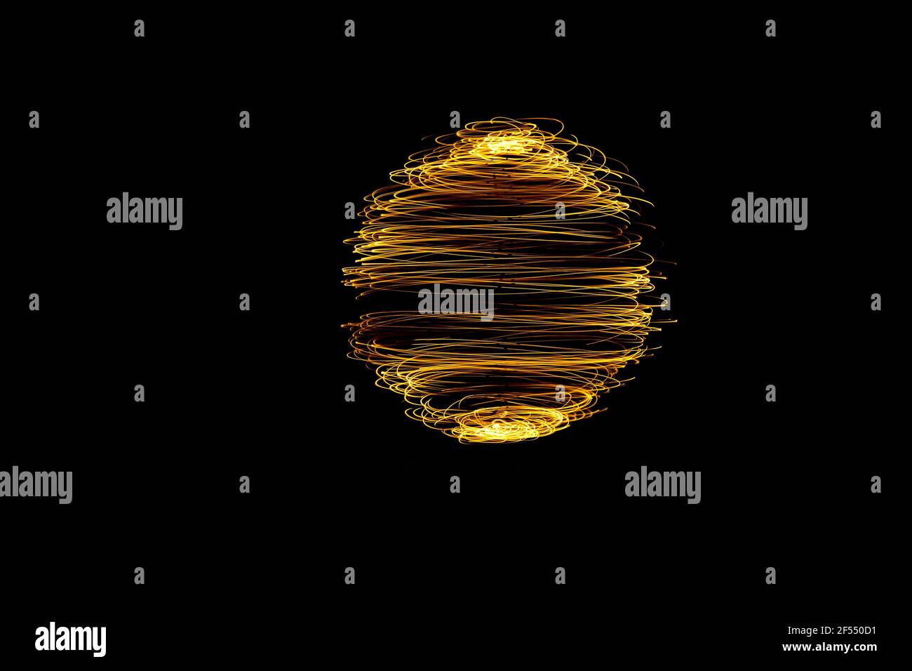 spherical light painting effect with yellow fairy lights that look ...