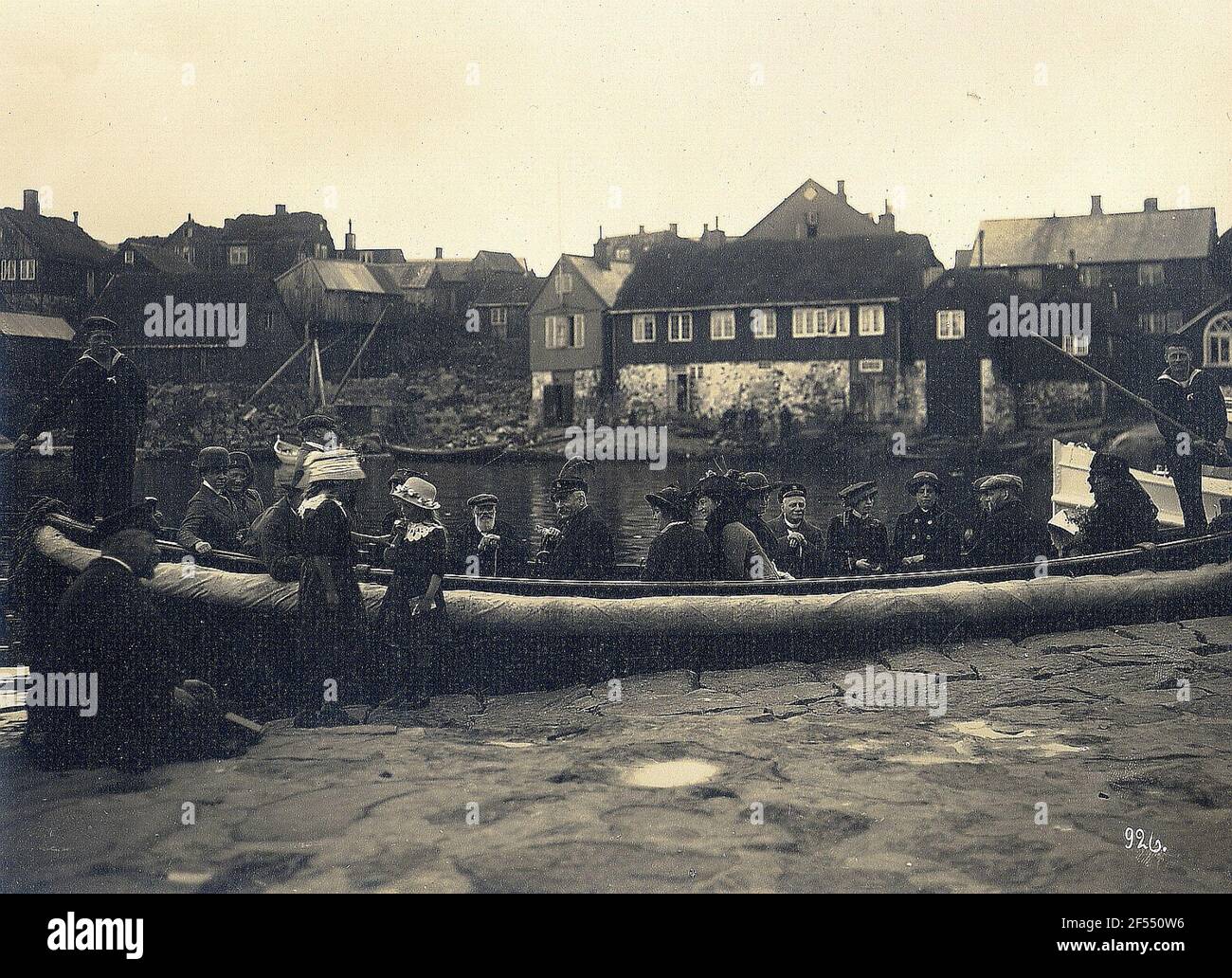Thorshavn / Faroe Islands (Denmark). Port. Tourists sitting in a rowing ...